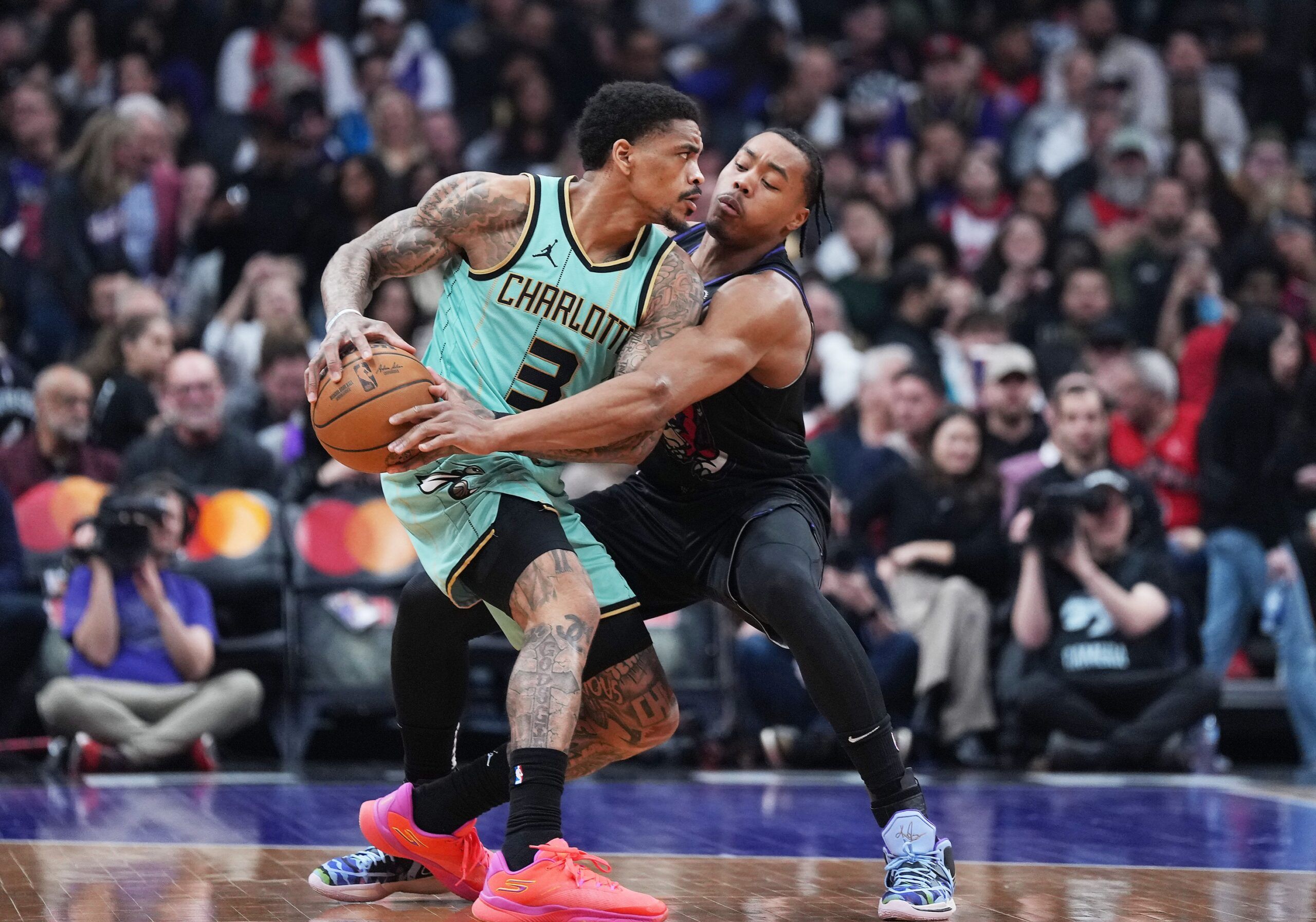 Mogbo Records First Rookie Triple-Double of Season as Raptors Roll Past ...